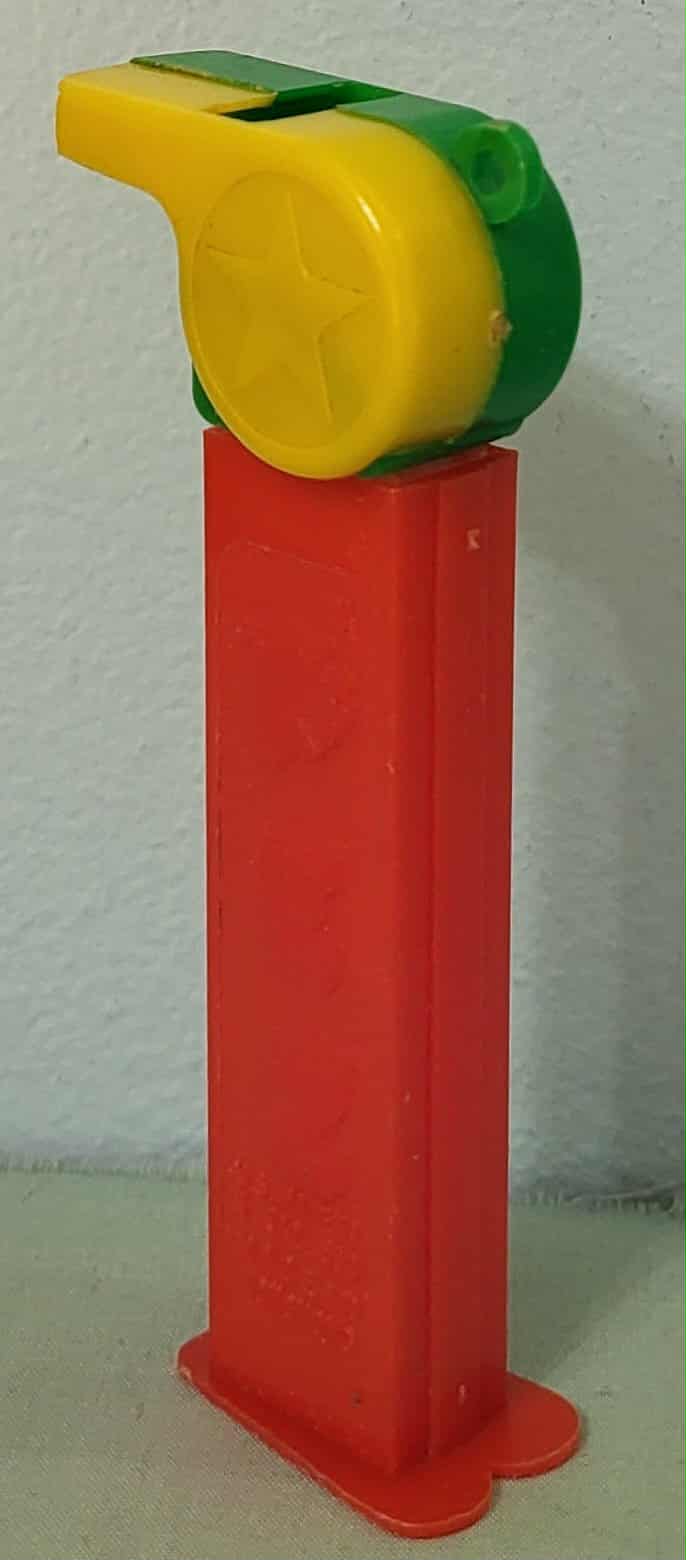 3.9 Hong Kong Thin Foot Coach Whistle Pez Yellow and Green Loop on Red - $10.00