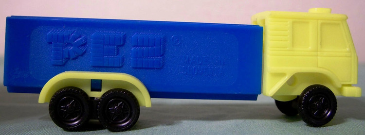 D Series Truck R4 Yellow Cab on Blue Trailer Pez - $5.00